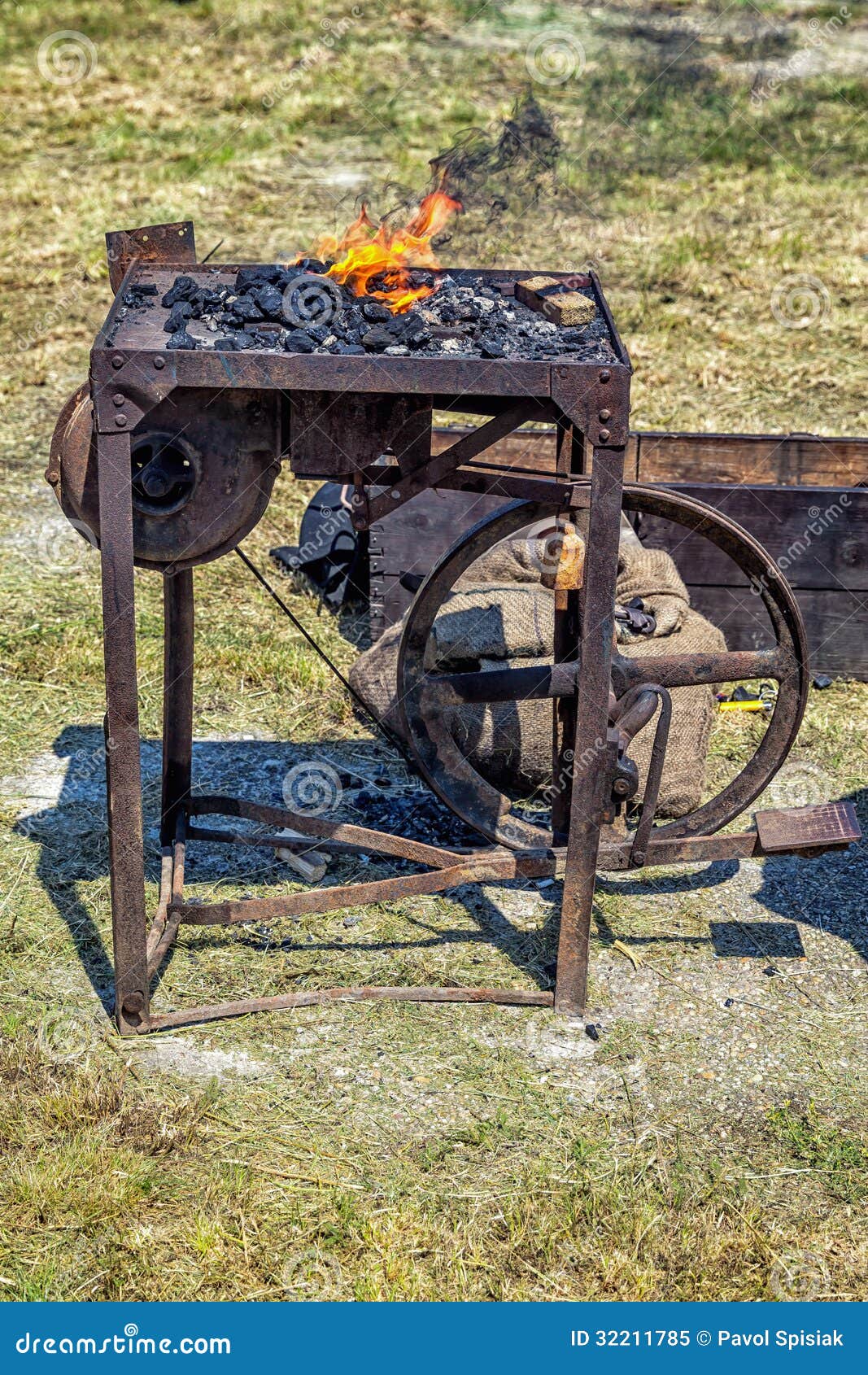 Blacksmith In Forge - Sharpening Iron Tools With Sparkles - Metal ...
