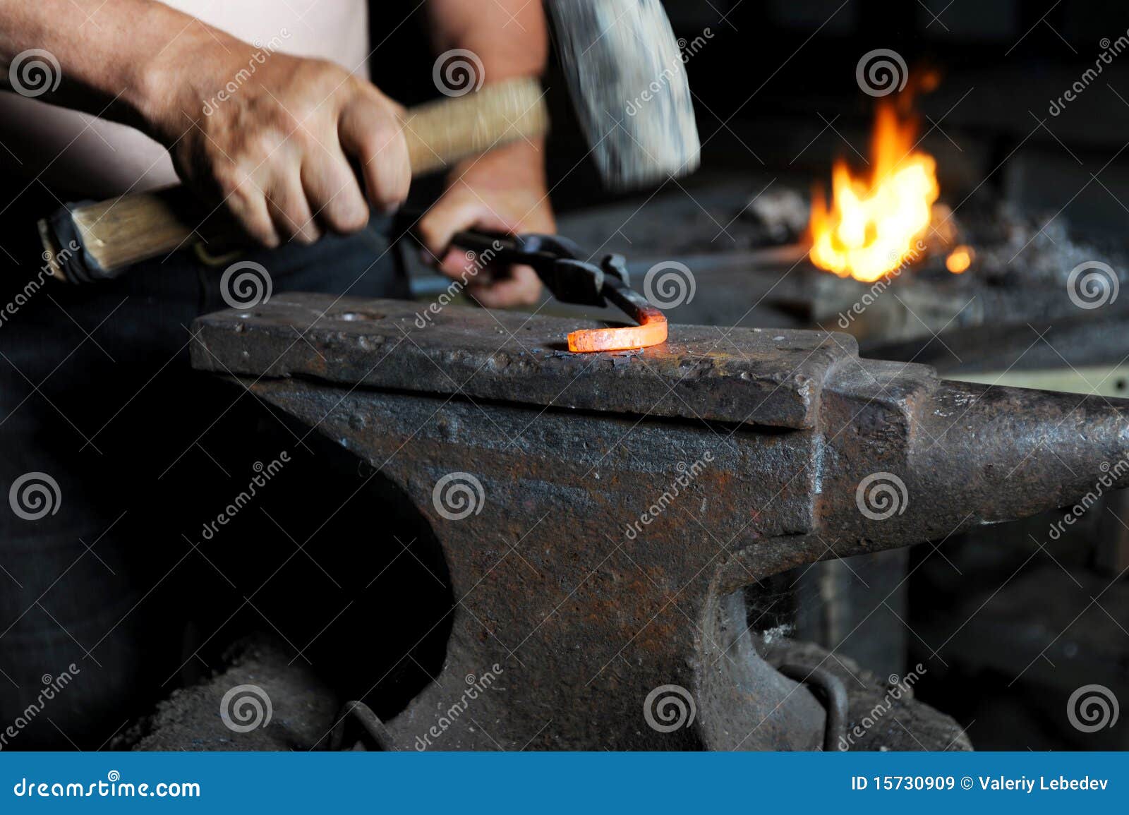 Blacksmith forges iron stock image. Image of molten, iron - 15730909