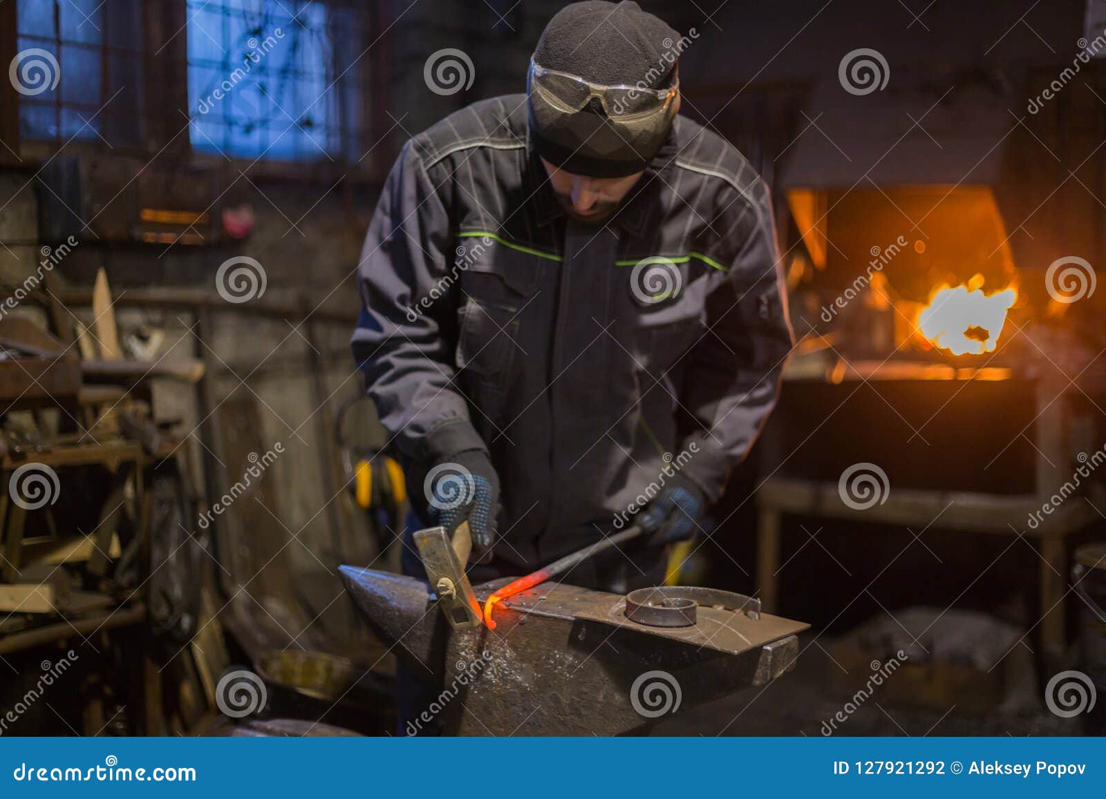 Blacksmith Forging Molten Metal Stock Photo - Image of skill ...