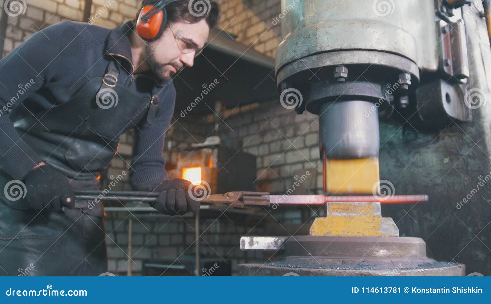 Blacksmith Forging Red Hot Iron on Anvil - Automatic Hammering Stock ...