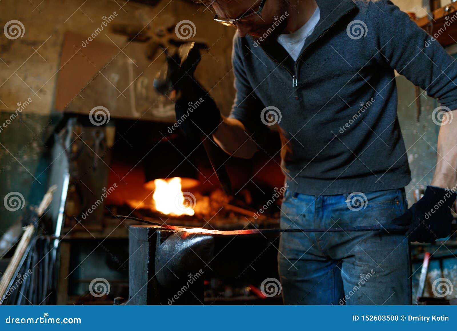 Blacksmith Forging Red-hot Metal with Hammer. Stock Photo - Image of ...