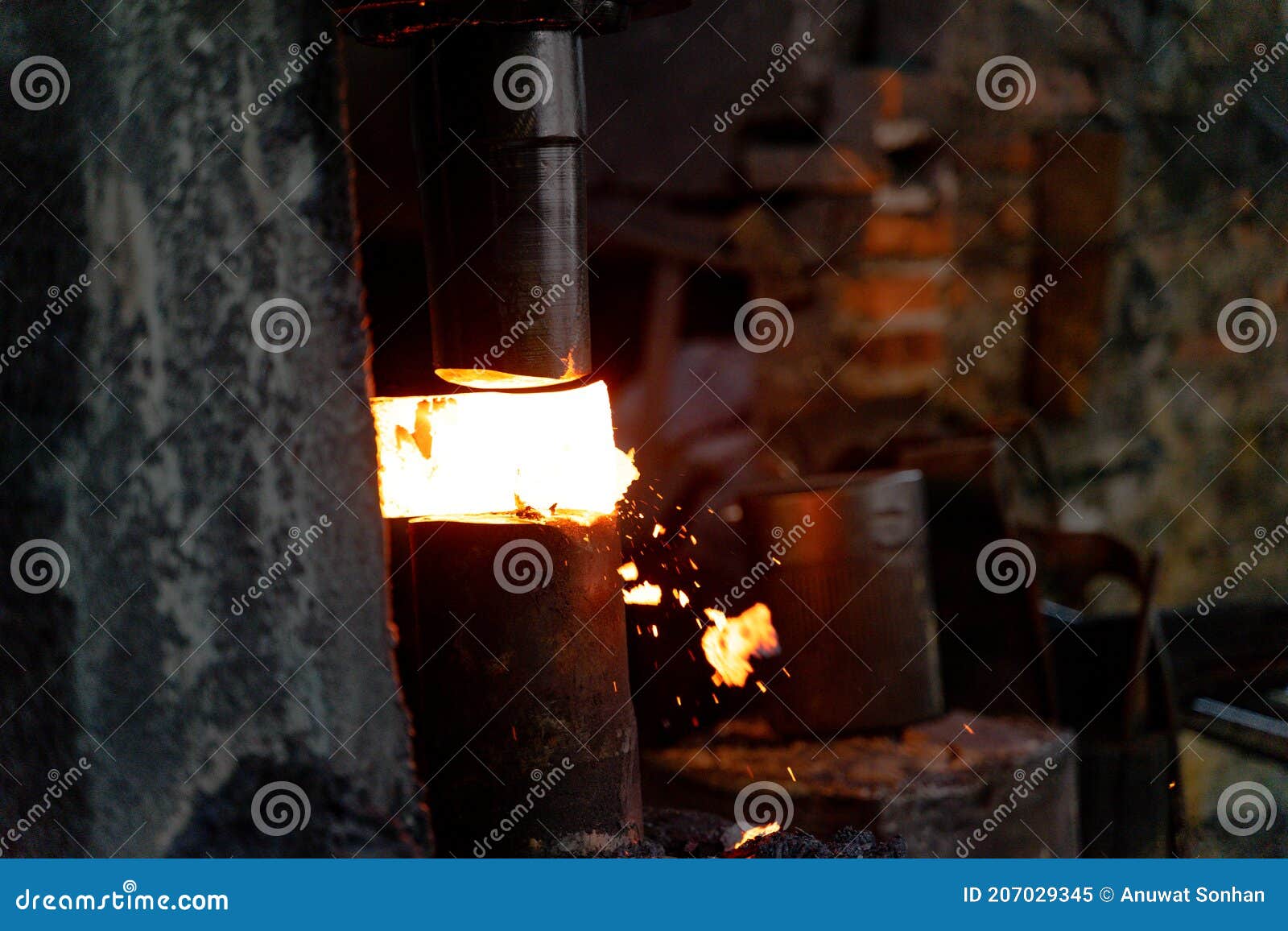 The Blacksmith is Forging Very Hot Iron To Make Various Tools Stock ...