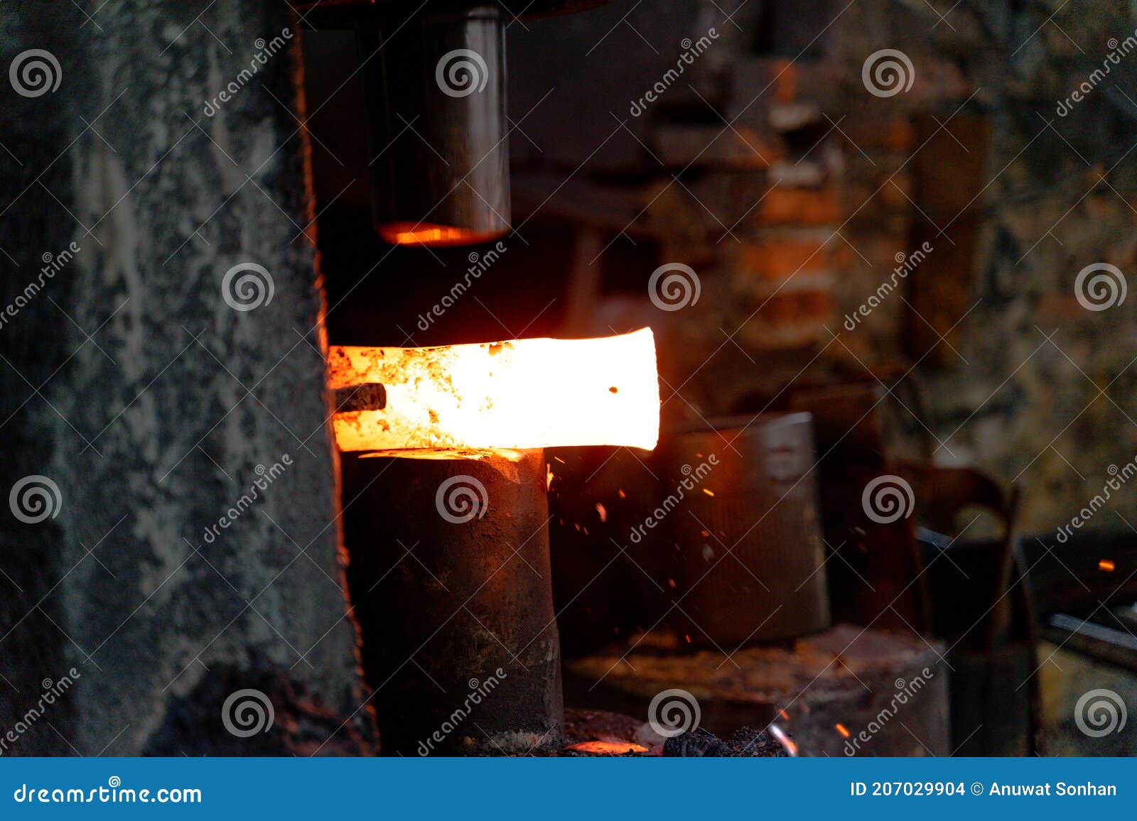 The Blacksmith is Forging Very Hot Iron To Make Various Tools Stock ...