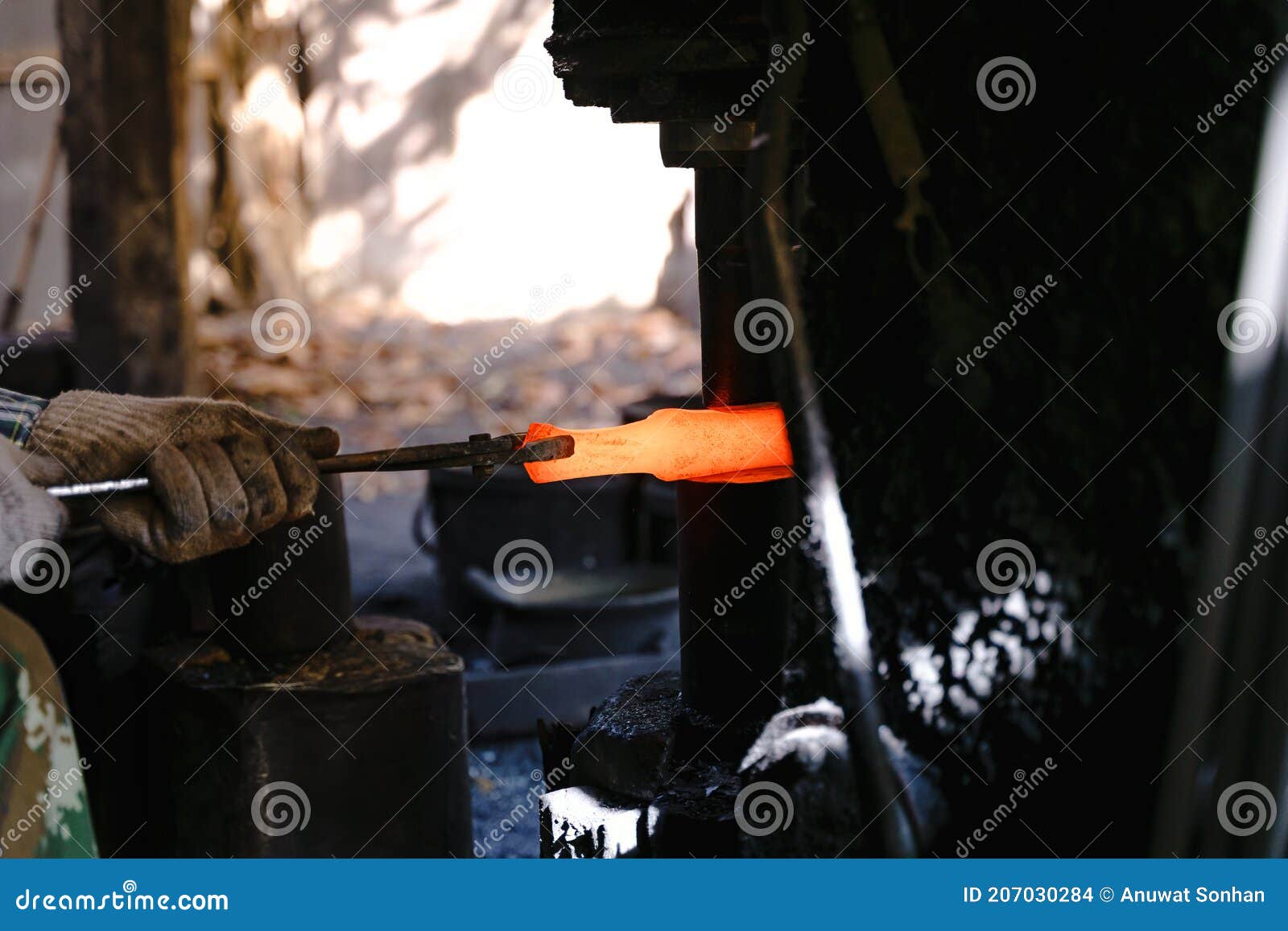 The Blacksmith is Forging Very Hot Iron To Make Various Tools Stock ...