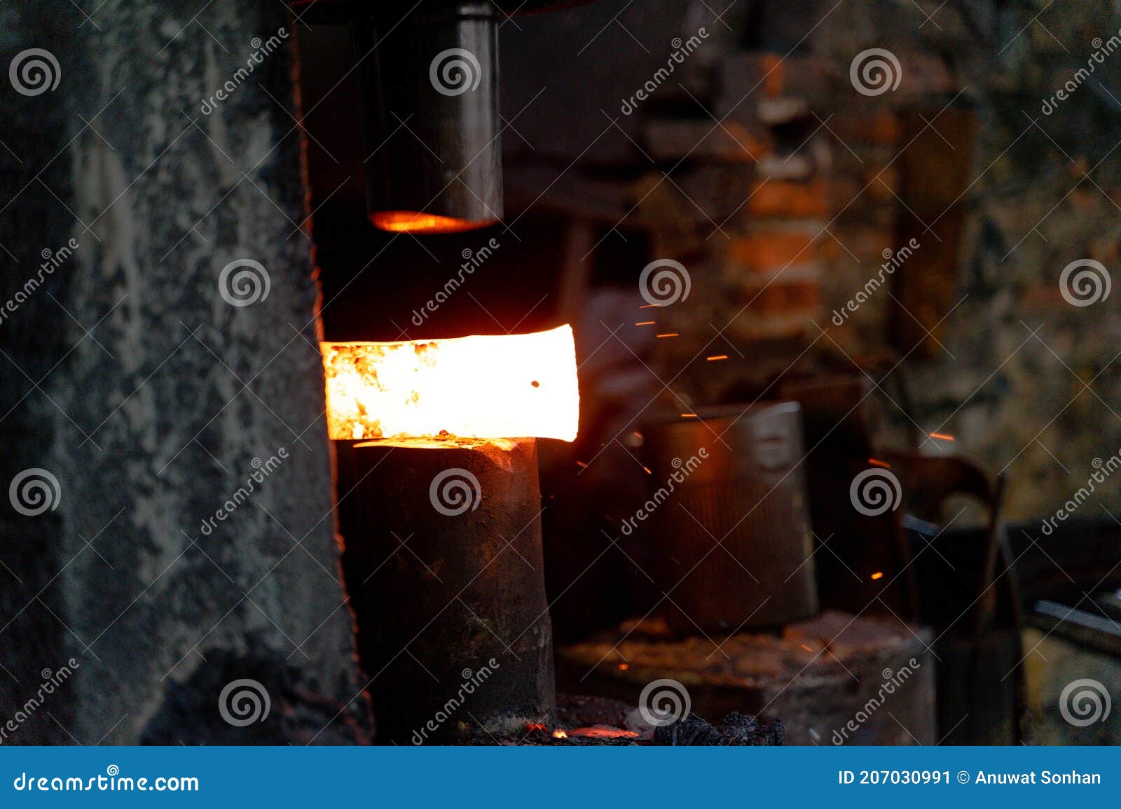 The Blacksmith is Forging Very Hot Iron To Make Various Tools Stock ...