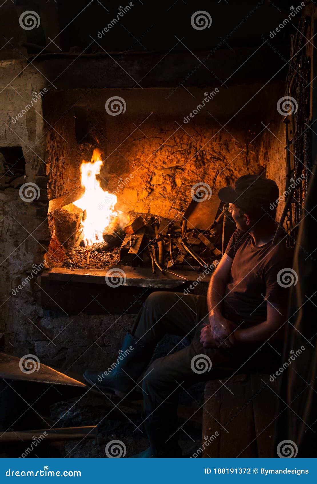 Blacksmith in Front of the Oven Stock Photo - Image of blacksmith ...