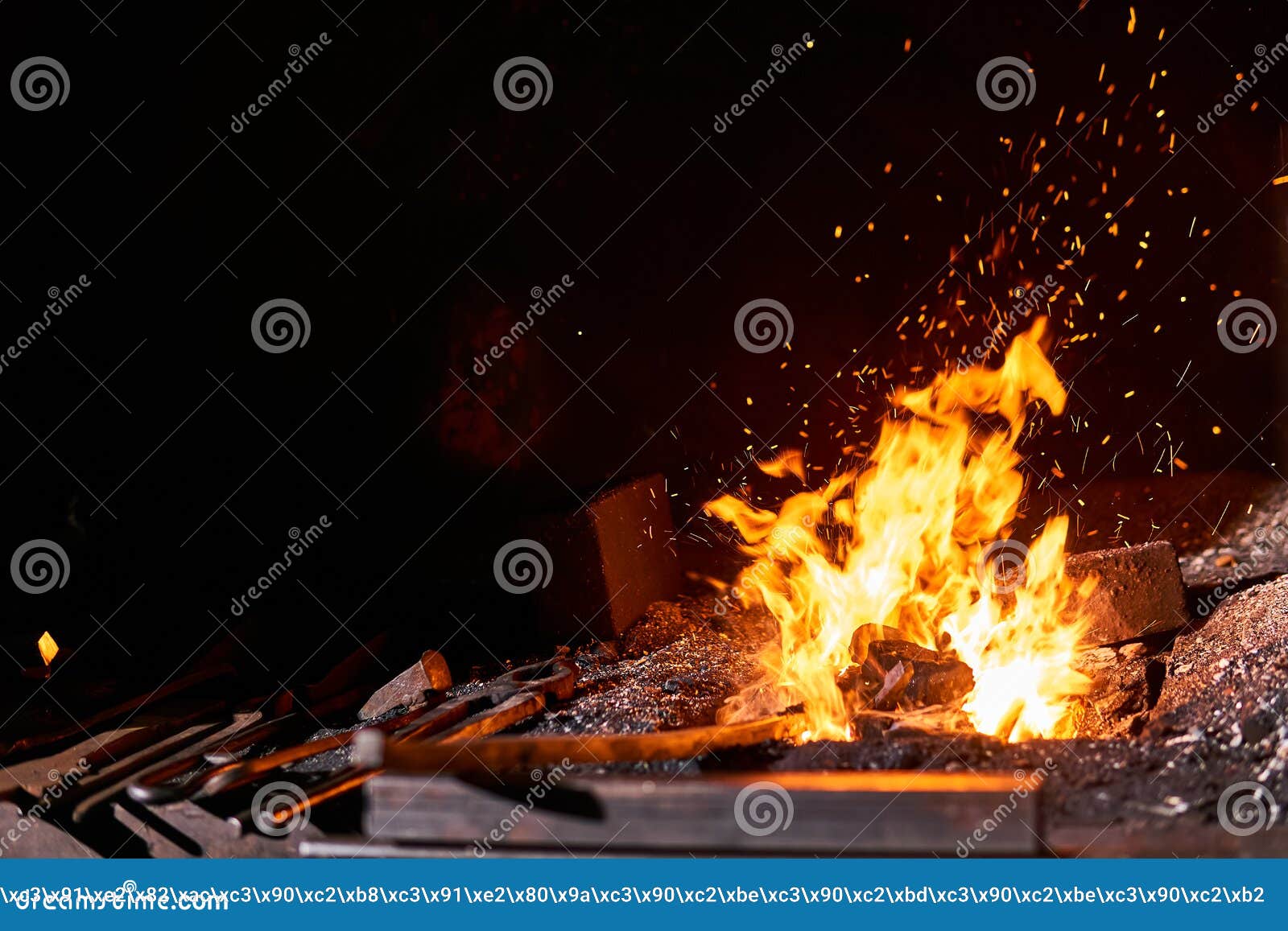 Blacksmith Furnace with Burning Fire and Forging Tools Lying Nearby ...