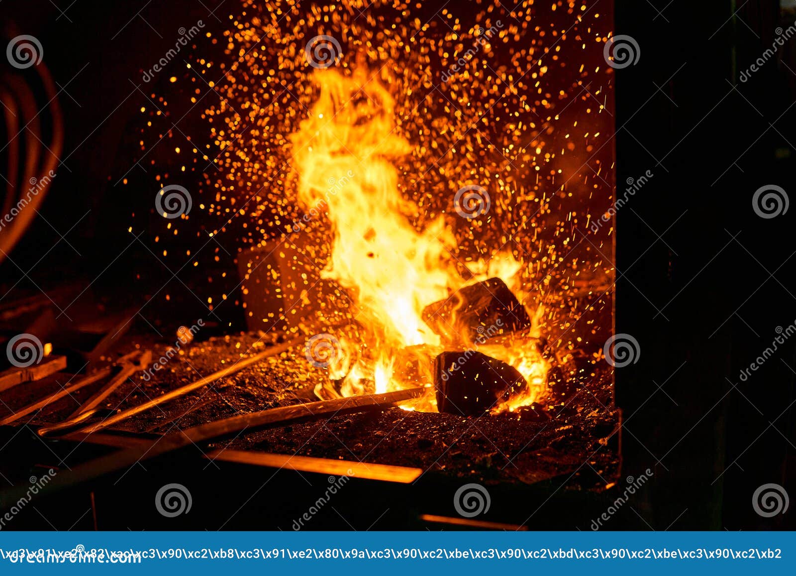 Blacksmith Furnace with Burning Fire and Forging Tools Lying Nearby ...