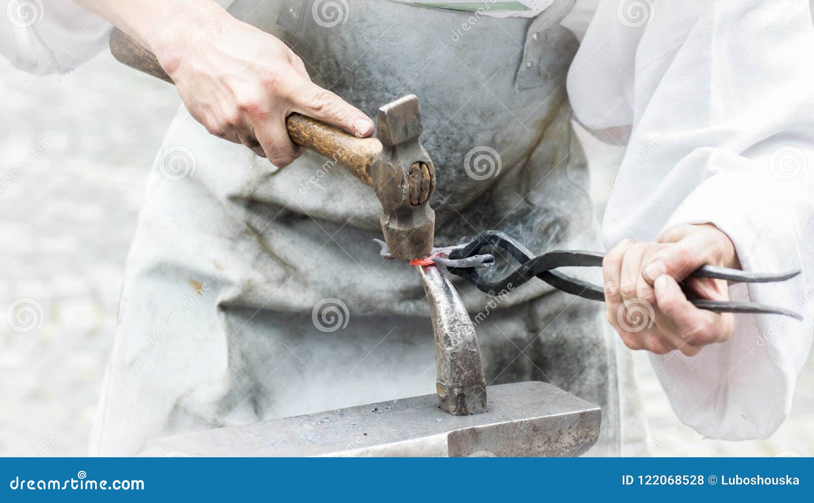A Blacksmith Hammering a Hot Metal Piece Stock Photo - Image of retro ...