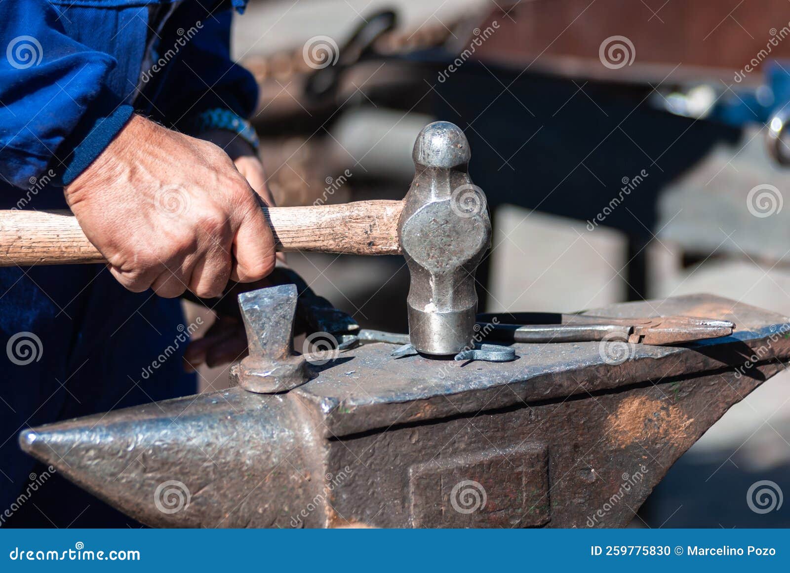 Blacksmith Hammering on a Metal Anvil Stock Photo - Image of anvil ...