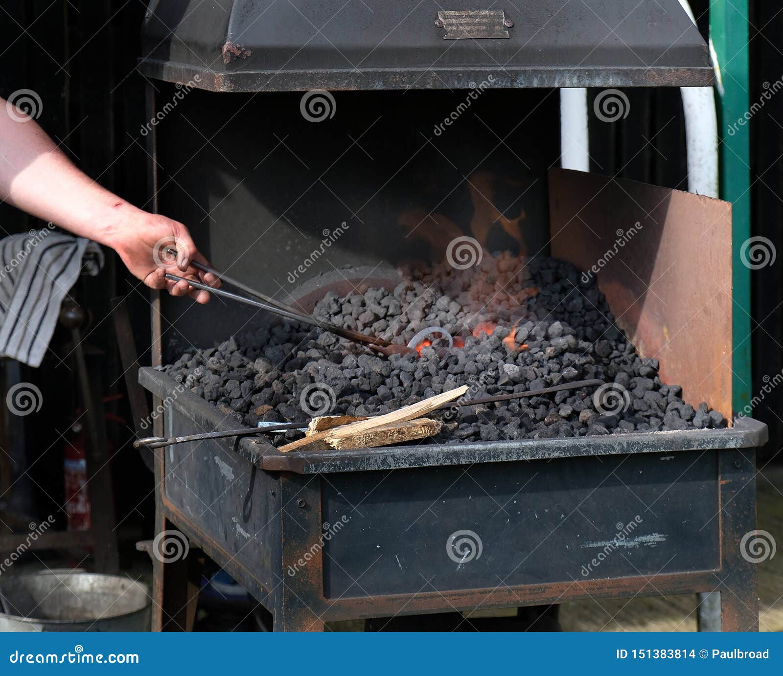 Blacksmith Heating Workpiece in Coke Fired Forge. Stock Photo - Image ...