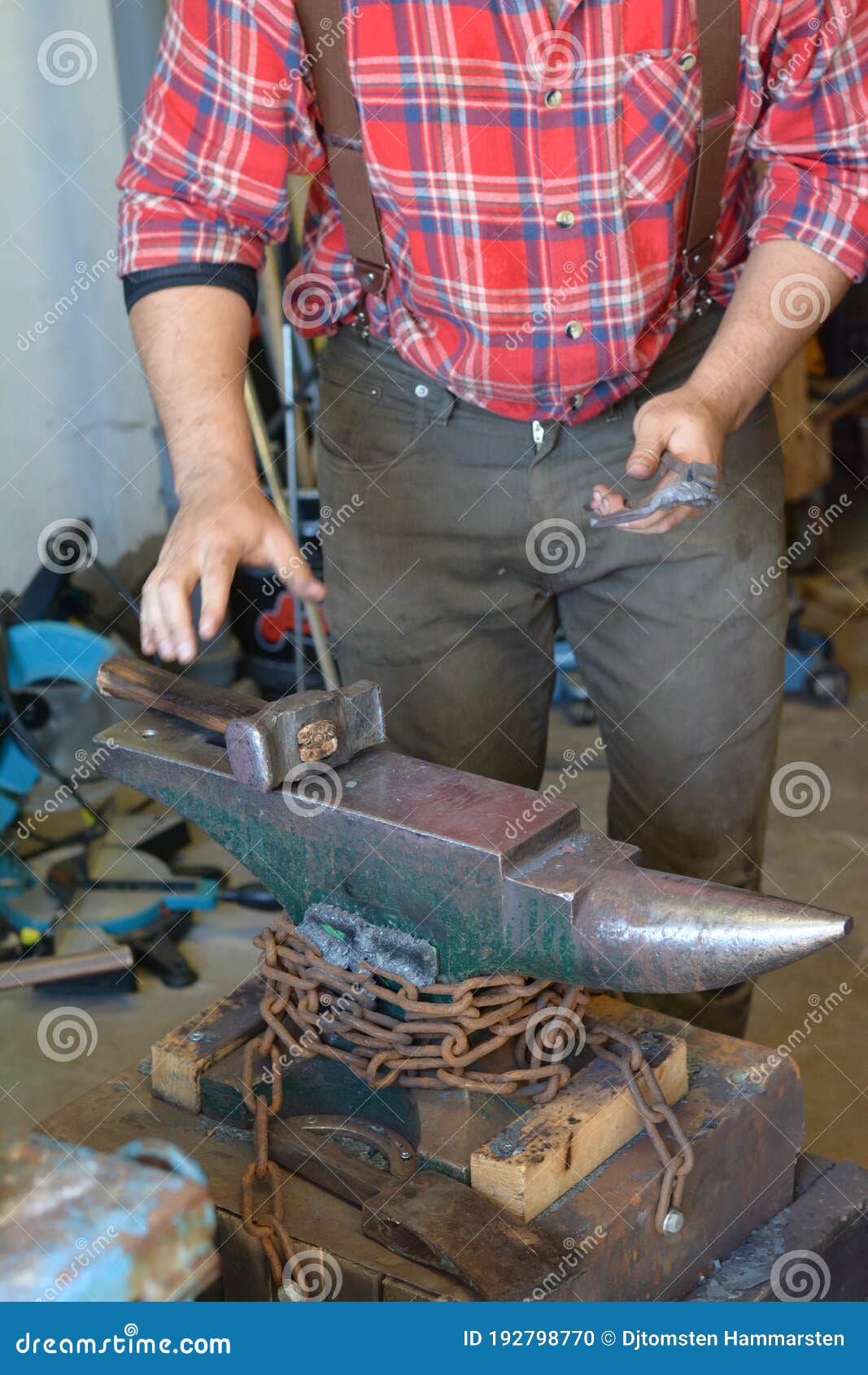 Blacksmith in His Home Workshop Making Tools Stock Photo - Image of ...