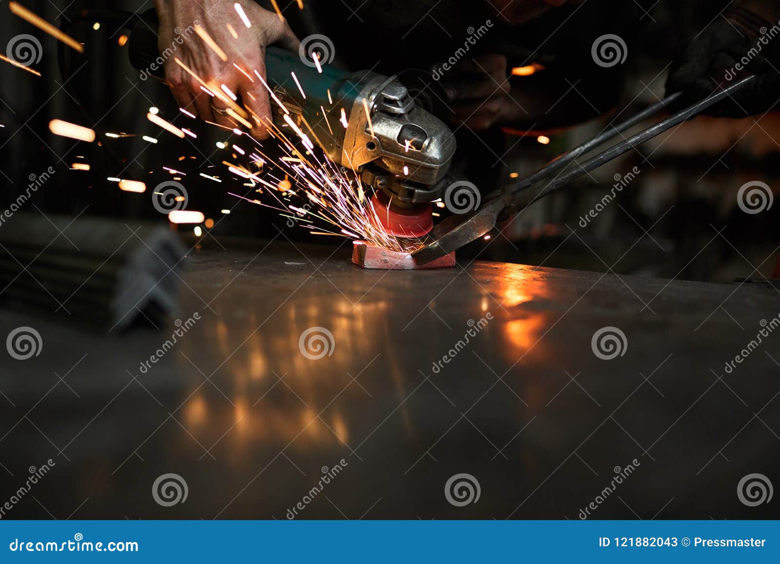 Processing hot workpiece stock image. Image of iron - 121882043
