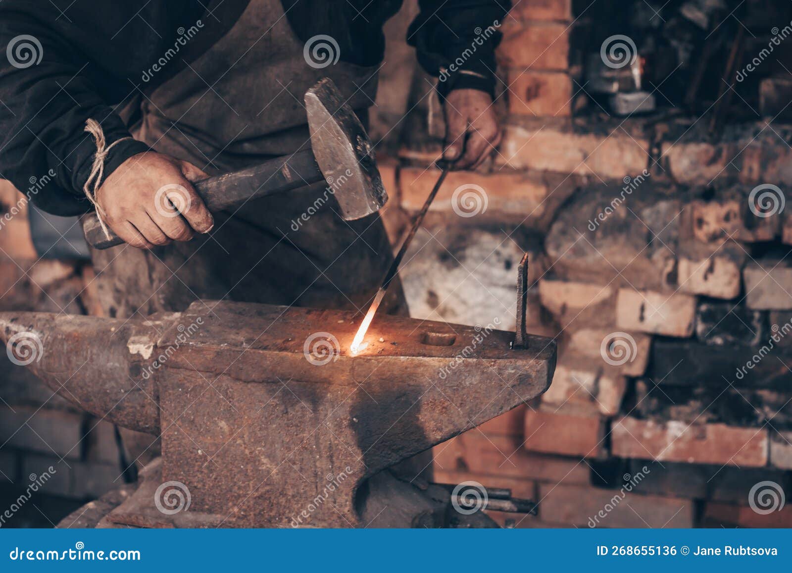 Blacksmith Process Glowing Metal with Hammer on Anvil in Forge. Dirty ...