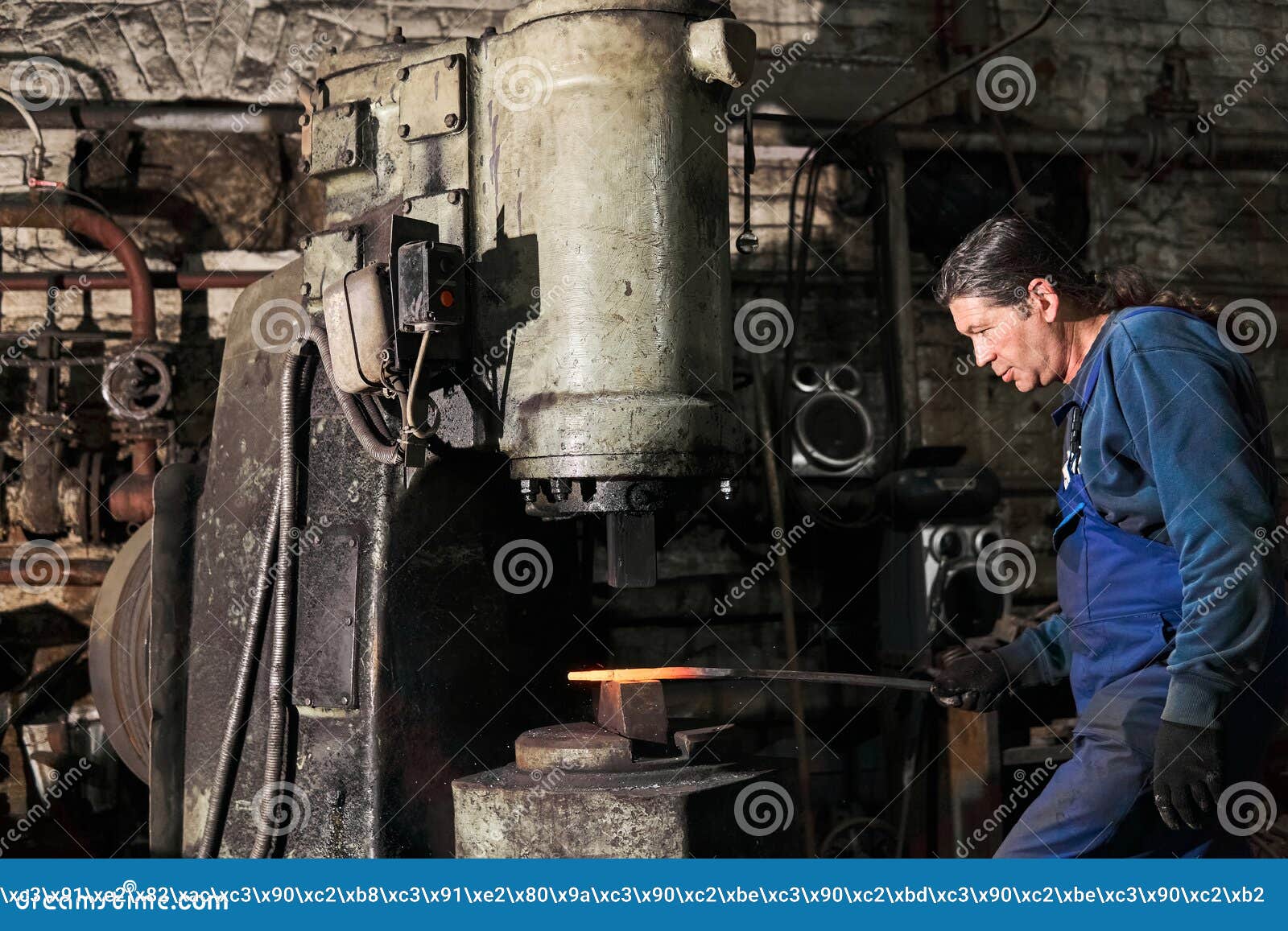 Blacksmith Processes a Hot Workpiece with a Pneumatic Hammer Stock ...