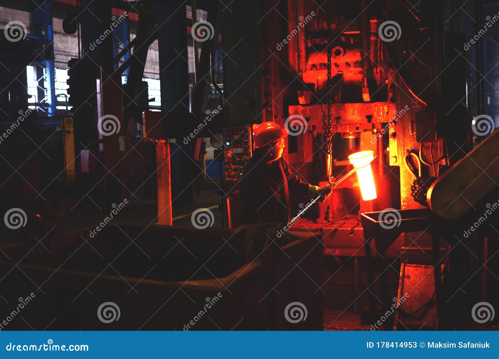 Blacksmith Processes the Red Hot Iron Under a Huge Press. Metal Forging ...