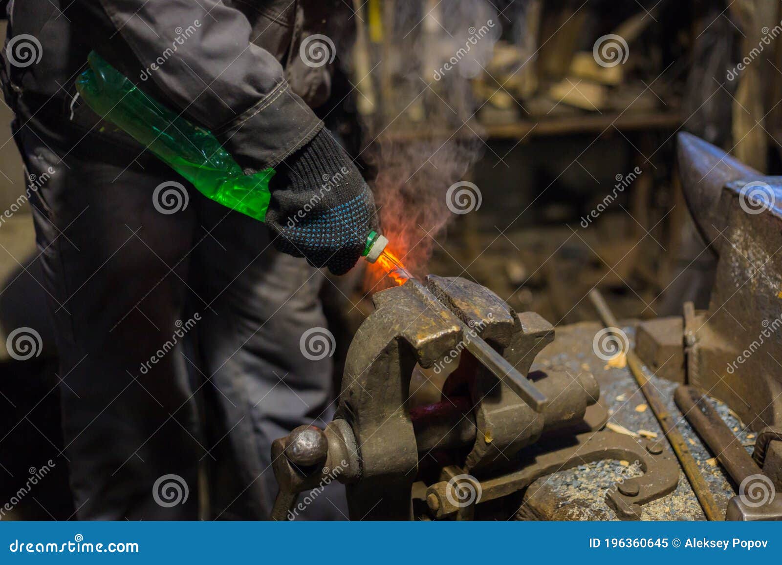 Blacksmith Quenching Hot Iron Part Stock Image - Image of quench, forge ...