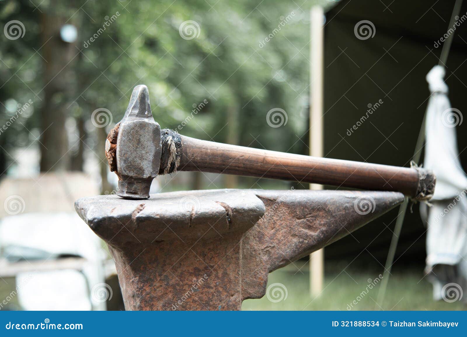 A Blacksmith S Hammer Lying on an Anvil . Outdoor Forge Stock Photo ...