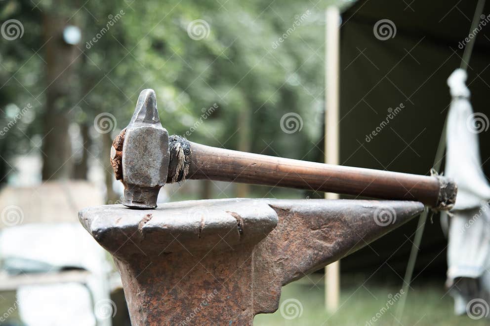 A Blacksmith S Hammer Lying on an Anvil . Outdoor Forge Stock Photo ...
