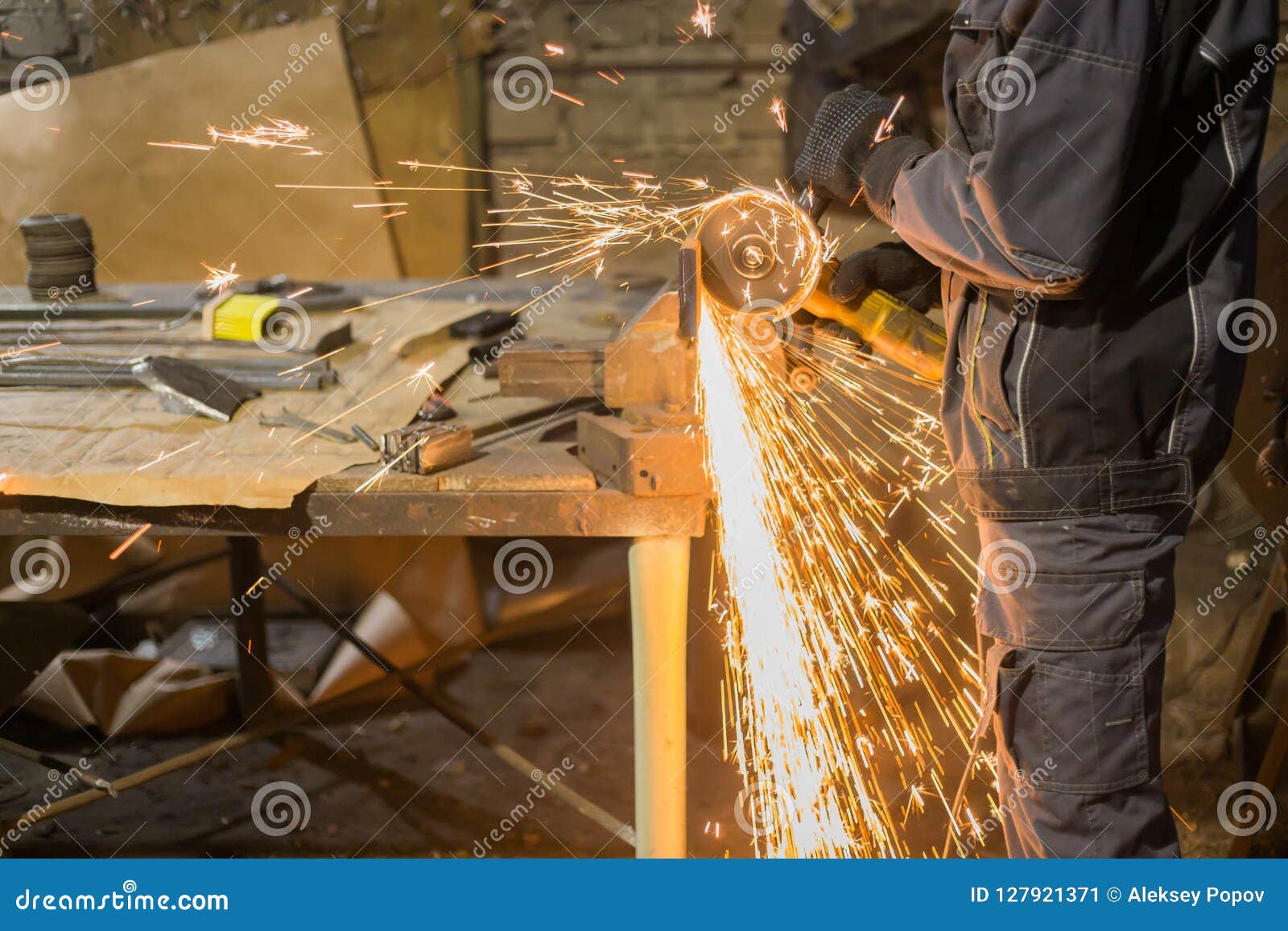Blacksmith Sawing Metal with Hand Circular Saw Stock Image - Image of ...