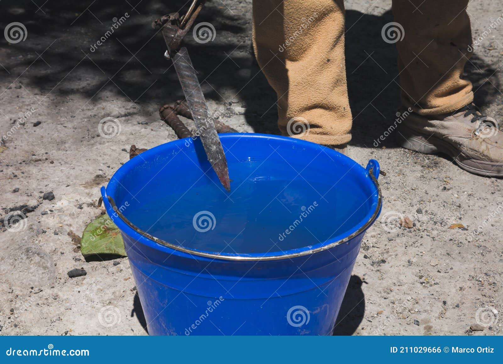 Blacksmith Tempering Metal in Water To Create Chisels for Carving Stone ...