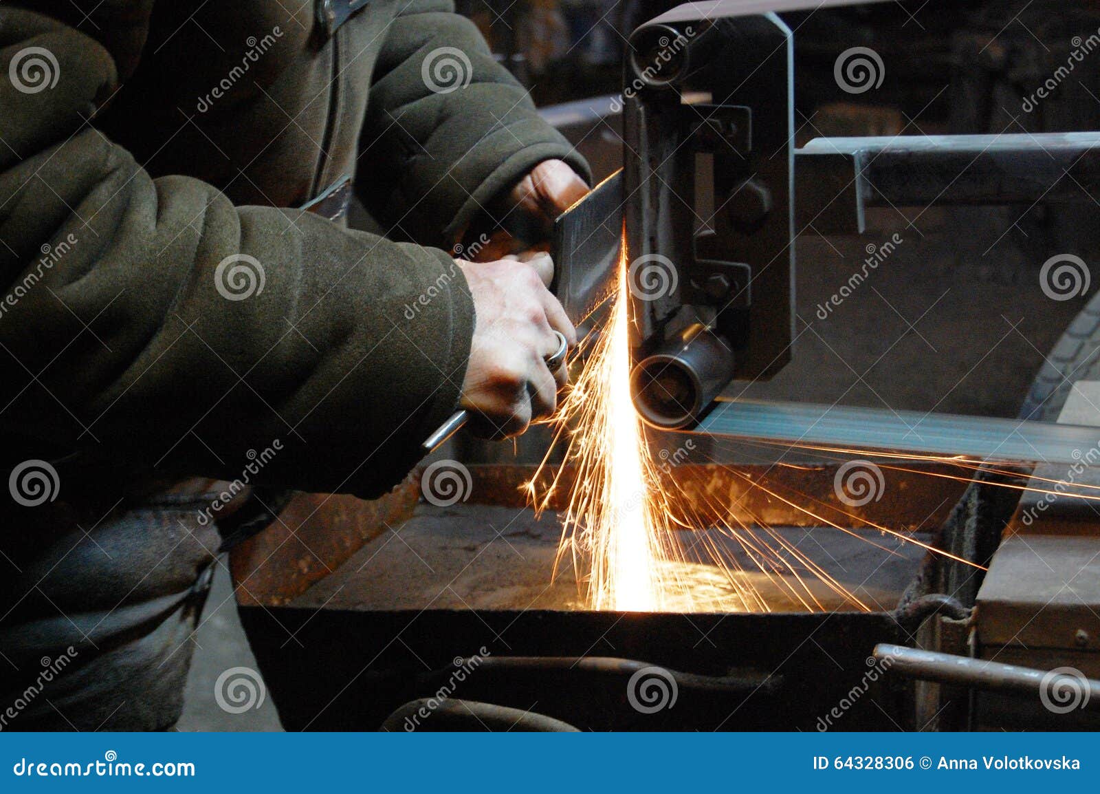 Blacksmith turning a knife stock photo. Image of activity - 64328306
