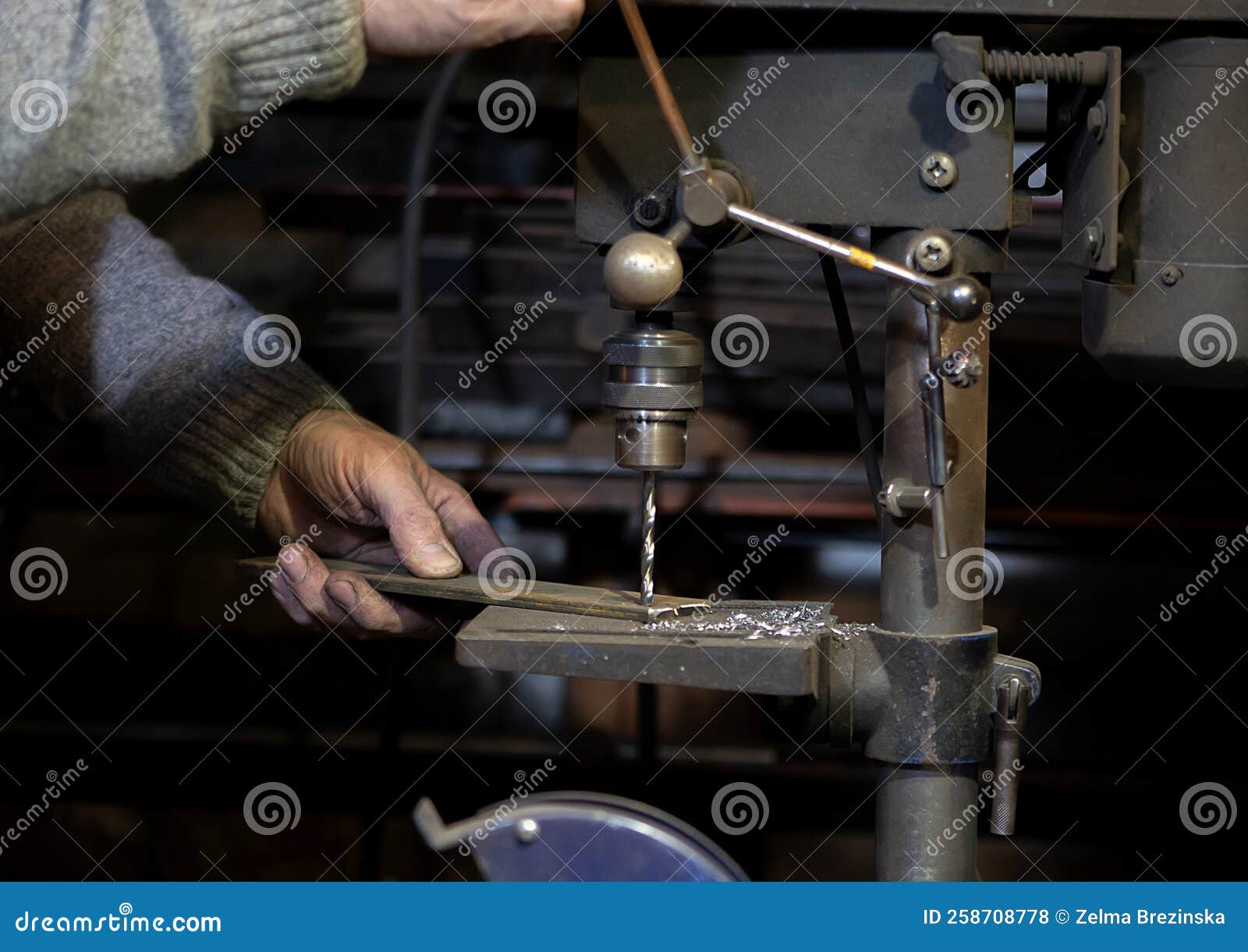 Blacksmith Uses Drill Press in Garage. a Close Up View of a Metalworker ...
