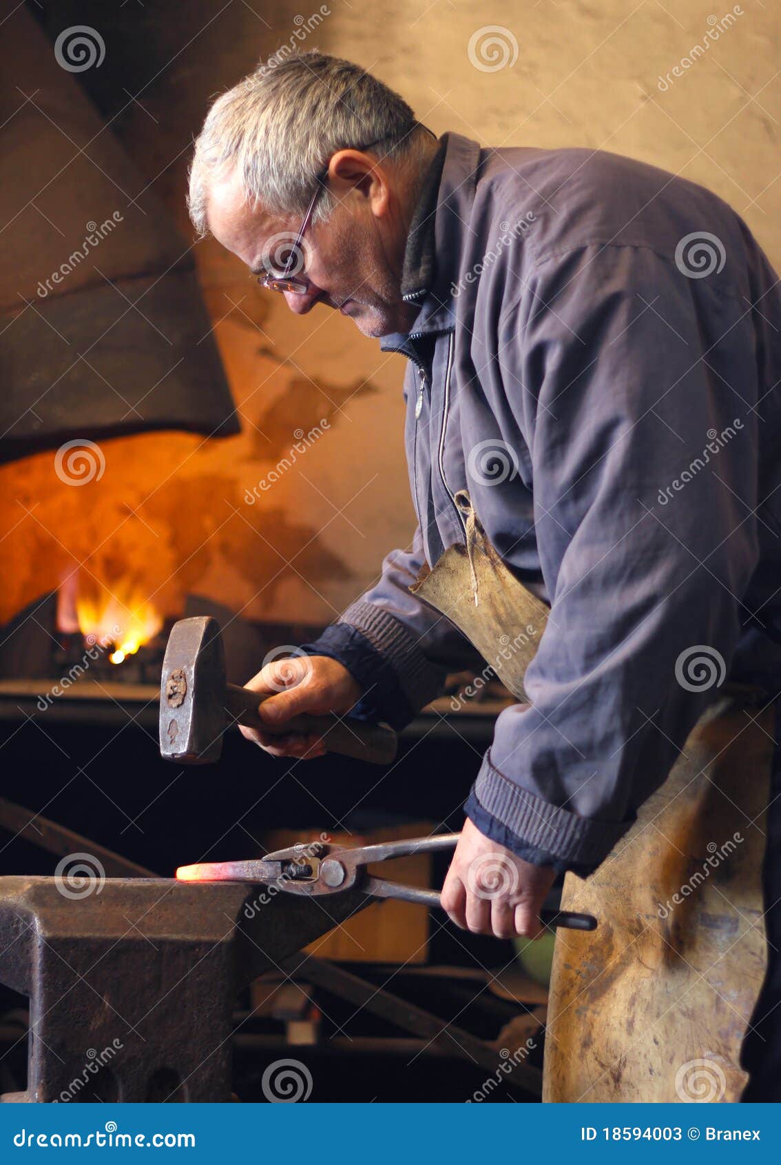 Blacksmith at work stock image. Image of handwork, anvil - 18594003
