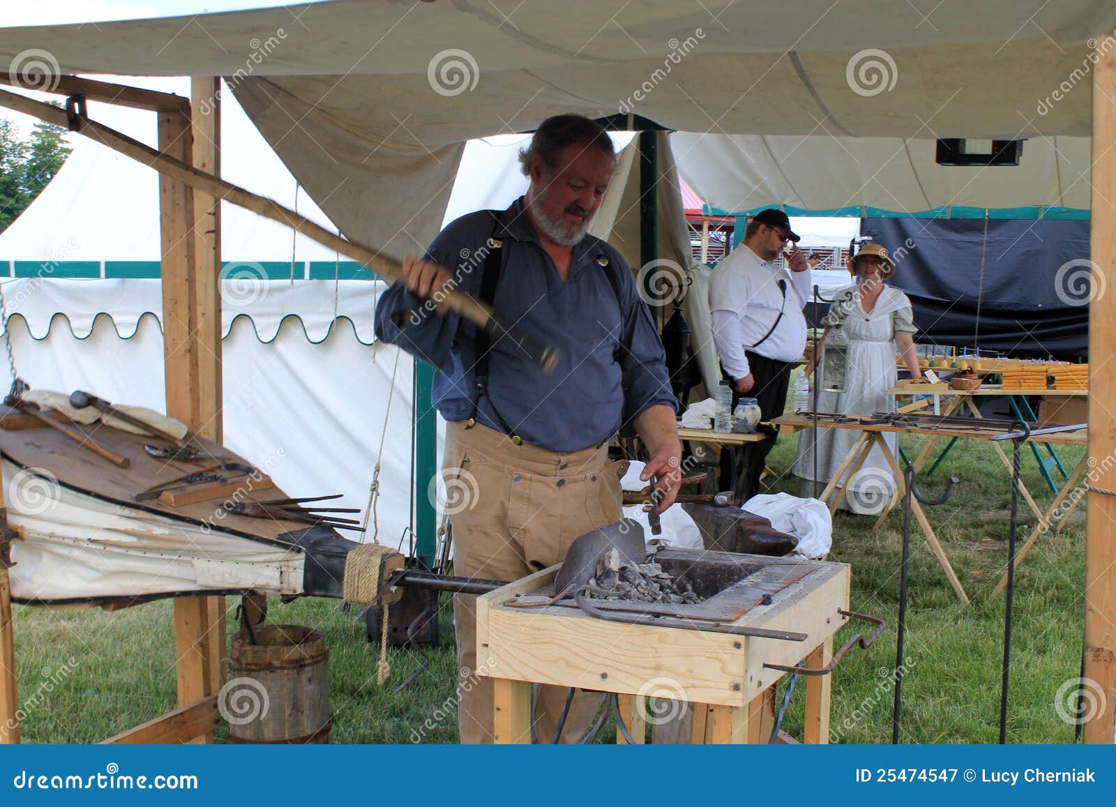 Blacksmith - Participant In The Knight Festival Sits In Anticipation Of ...