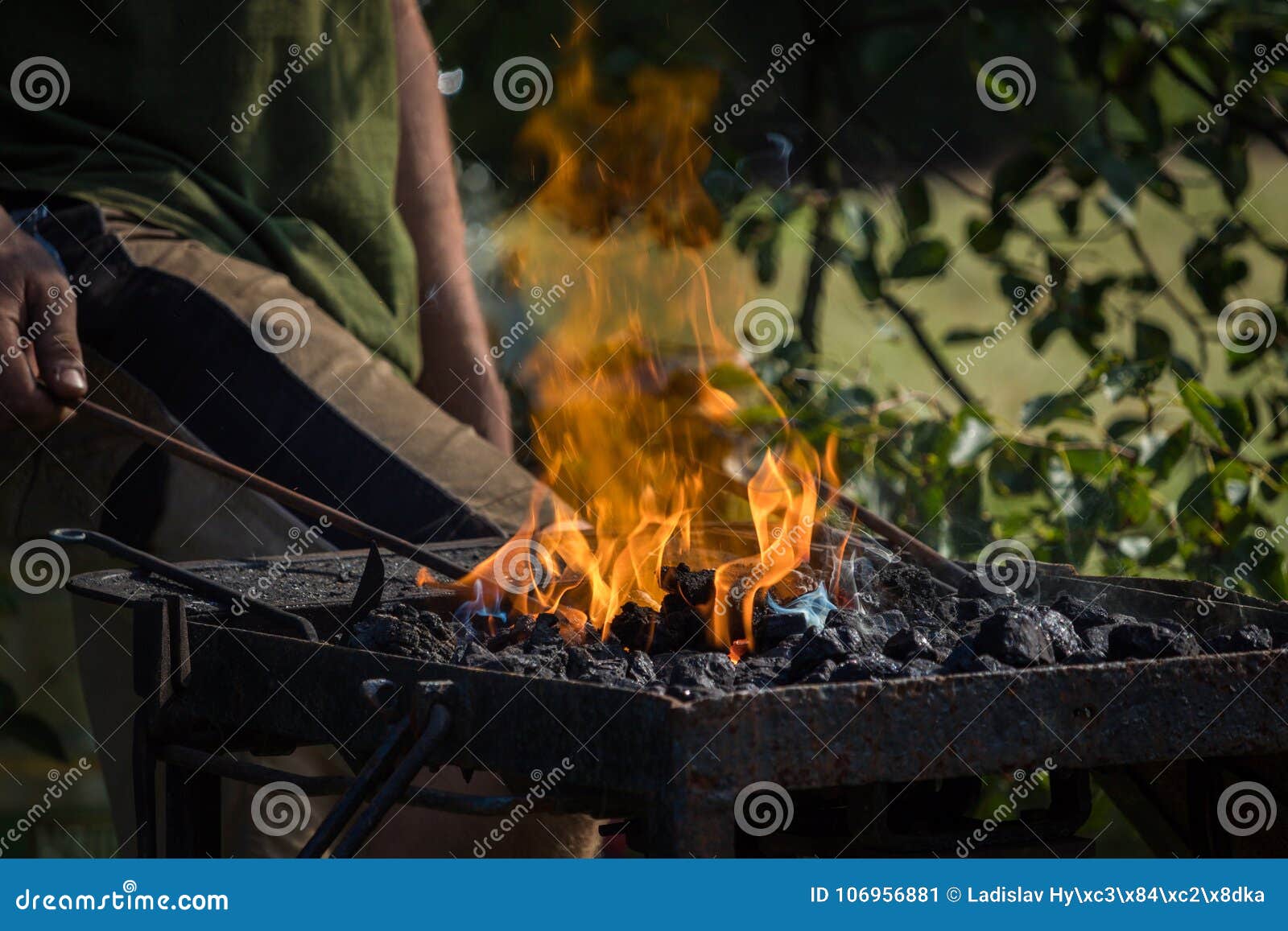 Blacksmith work with fire. stock image. Image of blacksmith - 106956881