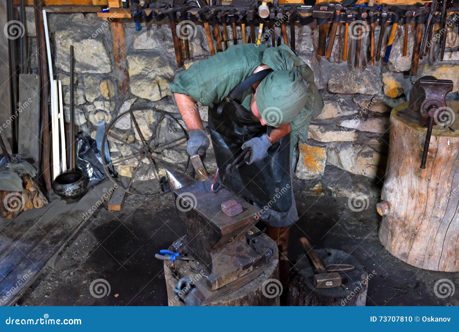 Blacksmith at work editorial image. Image of blacksmith - 73707810