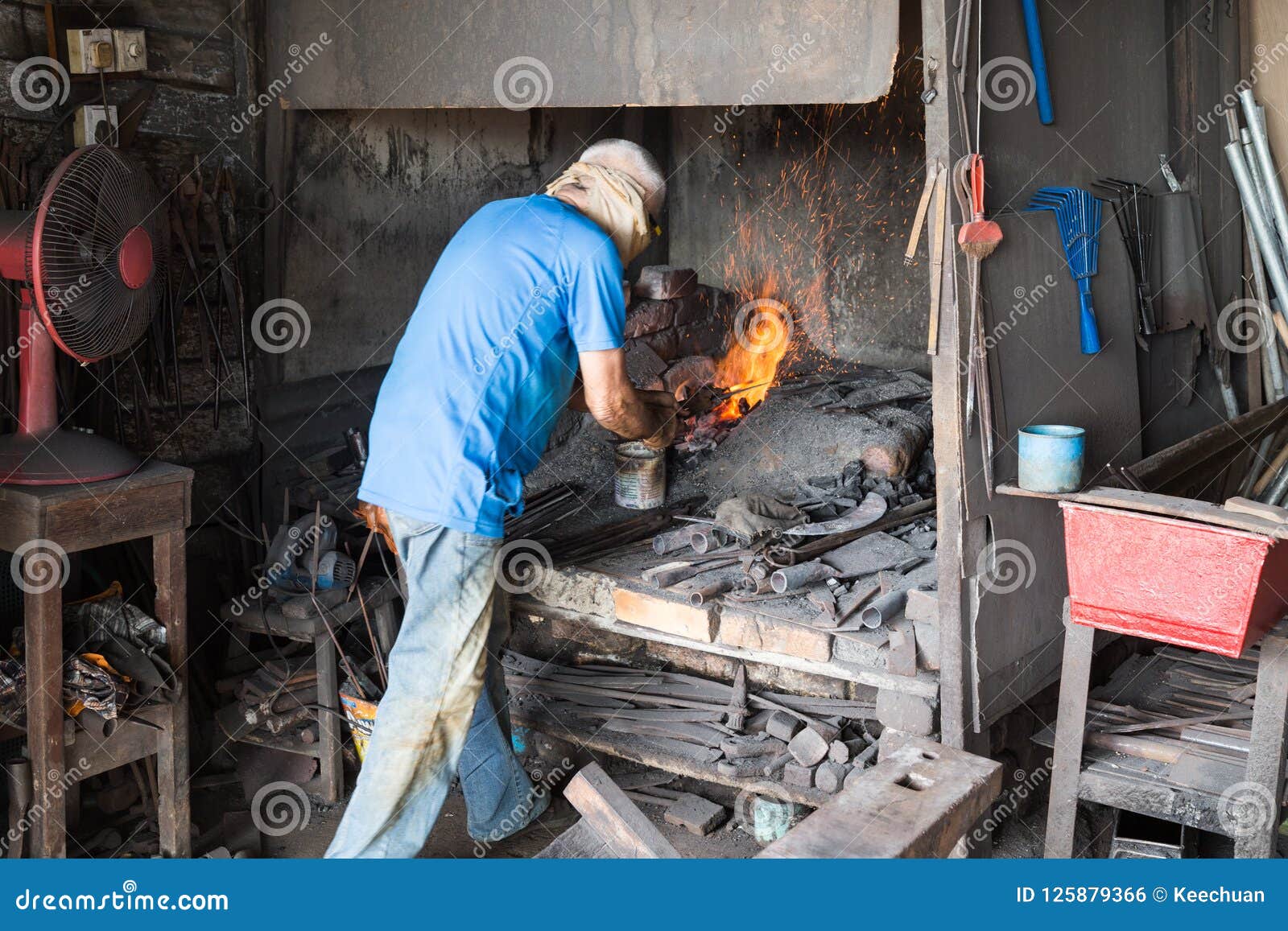 Blacksmith at Work in Small Workshop in Malaysia Stock Photo - Image of ...
