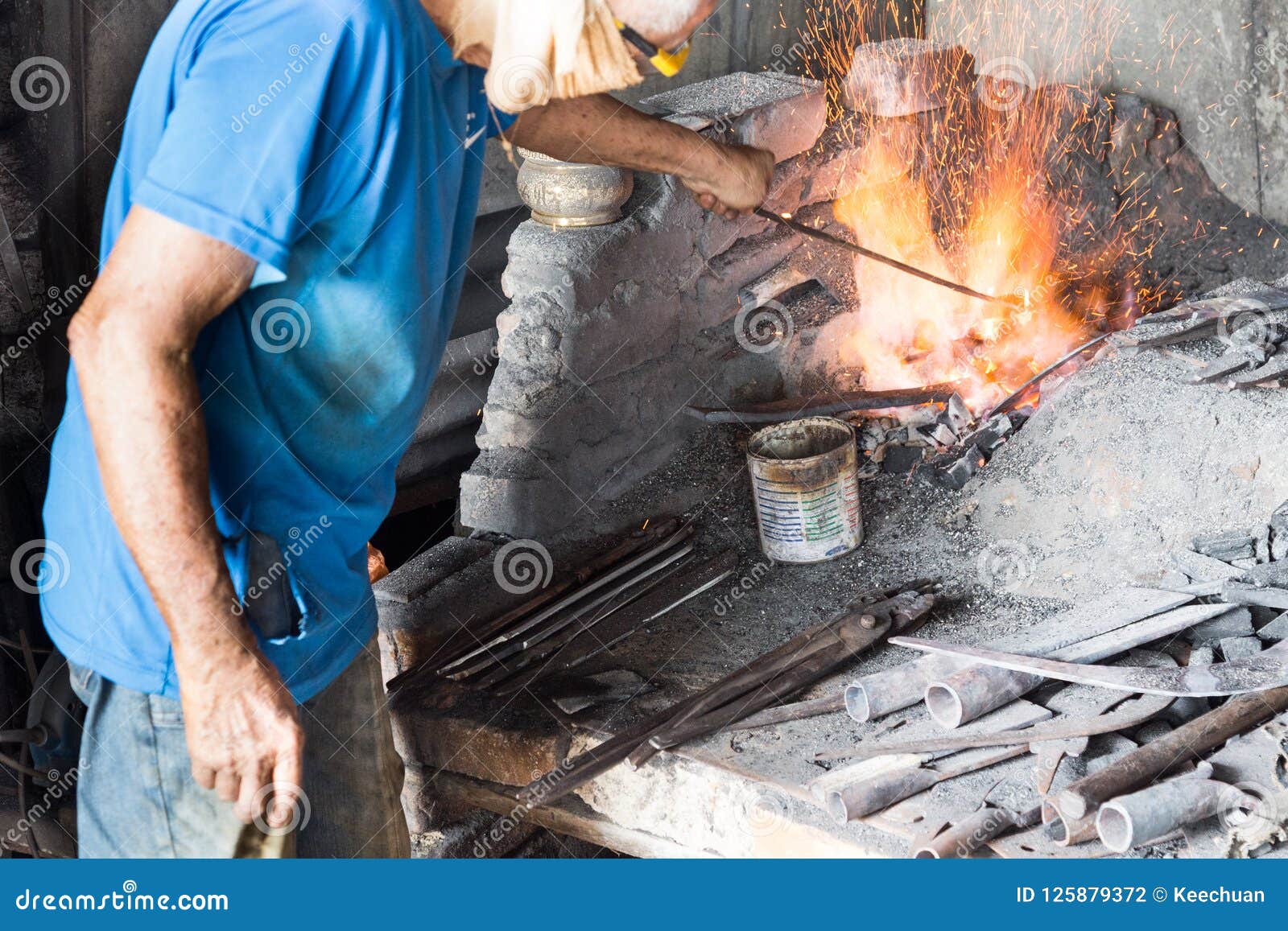 Blacksmith at Work in Small Workshop in Malaysia Stock Photo - Image of ...