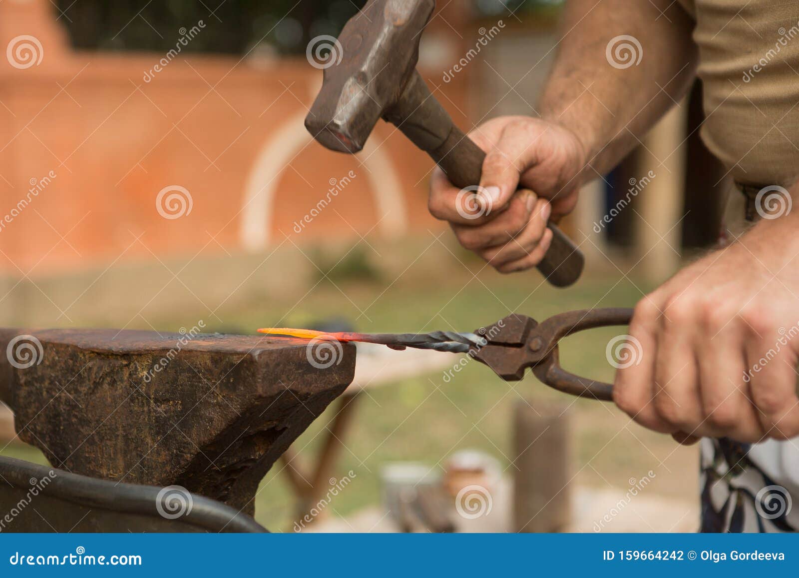 Blacksmith Working on Metal on an Anvil in the Forge Stock Photo ...