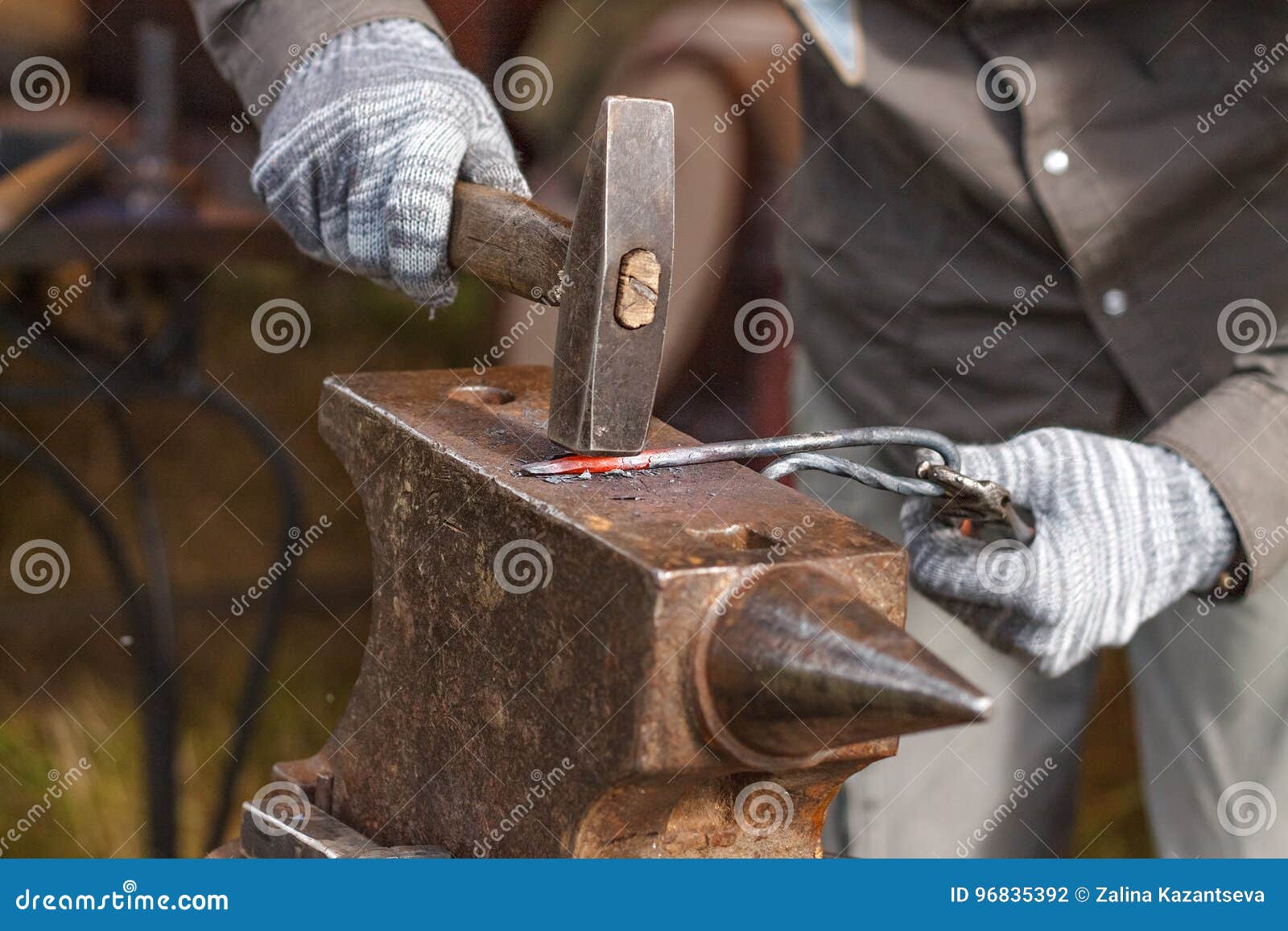 Blacksmith Working on Metal on Anvil at Forge High Speed Detail Shot ...