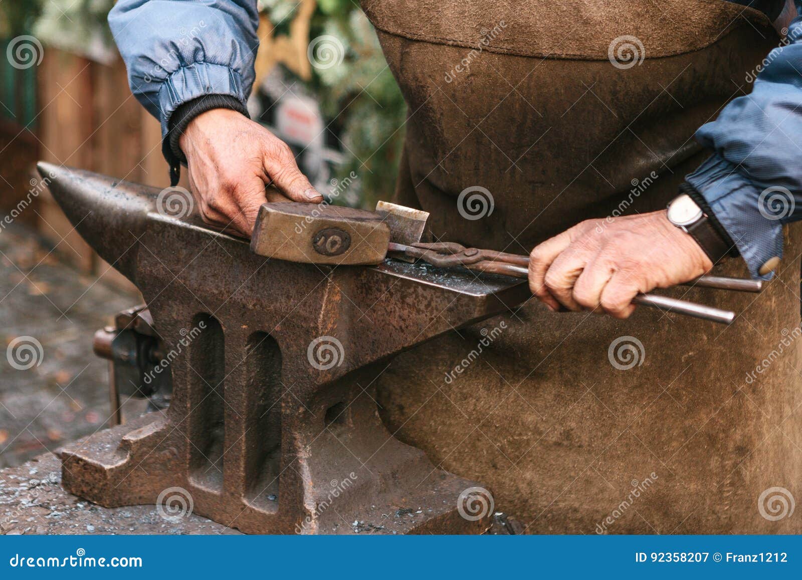 Blacksmith Working Metal with a Hammer on the Anvil in the Forge Stock ...