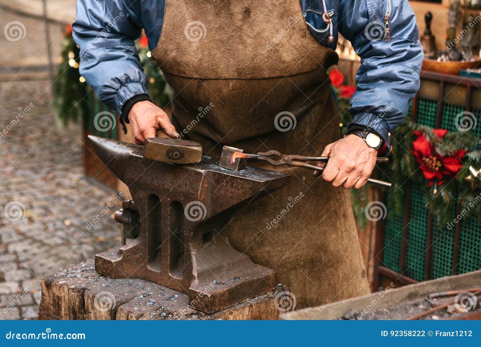 Blacksmith Working Metal with a Hammer on the Anvil in the Forge Stock ...