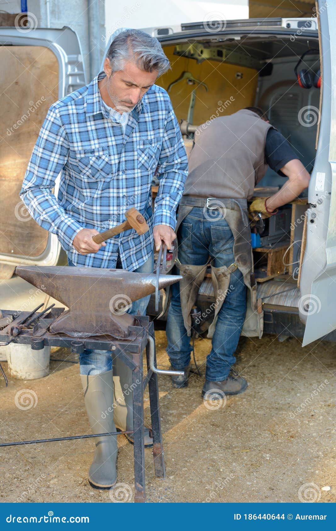 Blacksmith Working Outdoors Stock Photo - Image of metal, equipment ...
