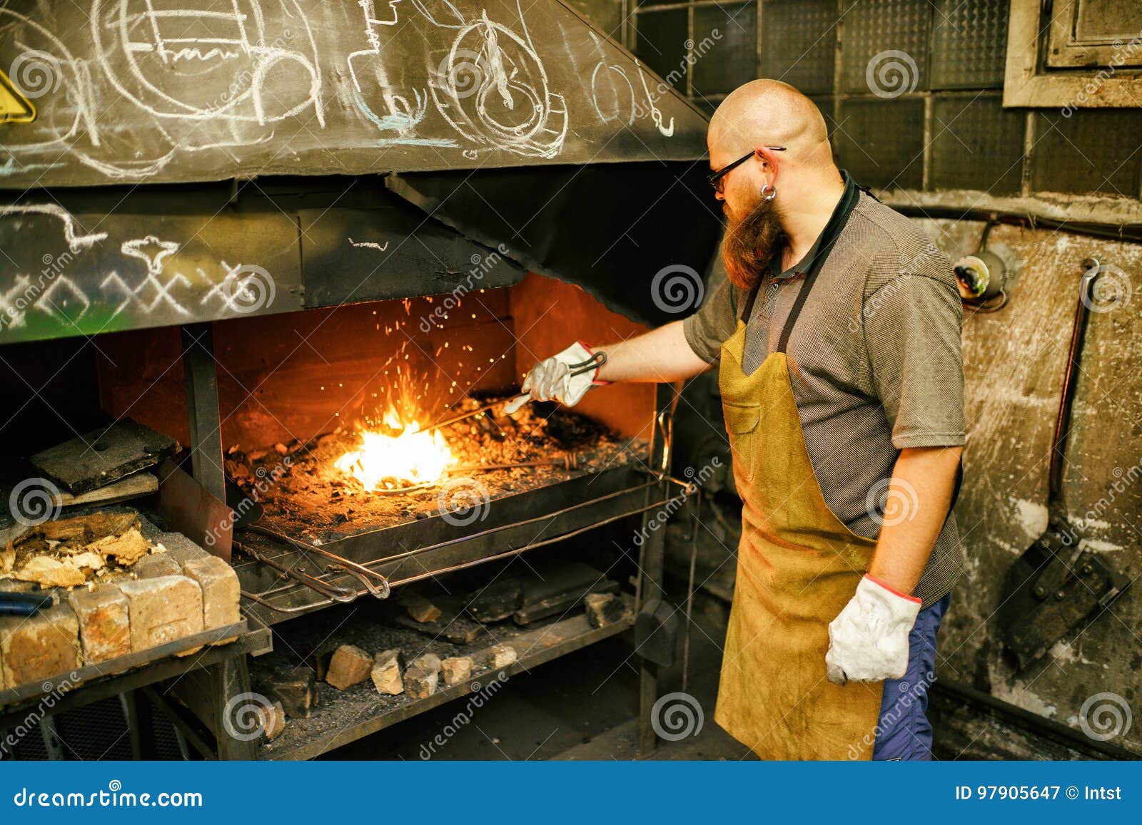 Blacksmith Working in Workshop Stock Image - Image of flame, metal ...