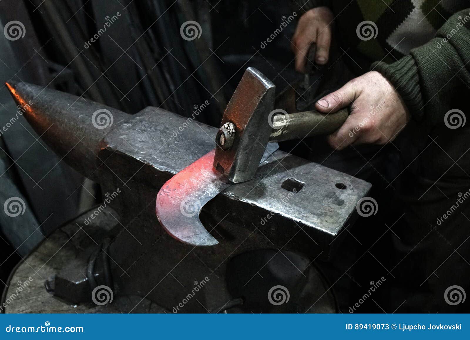 Blacksmith Working in Workshop Stock Image - Image of metallic ...