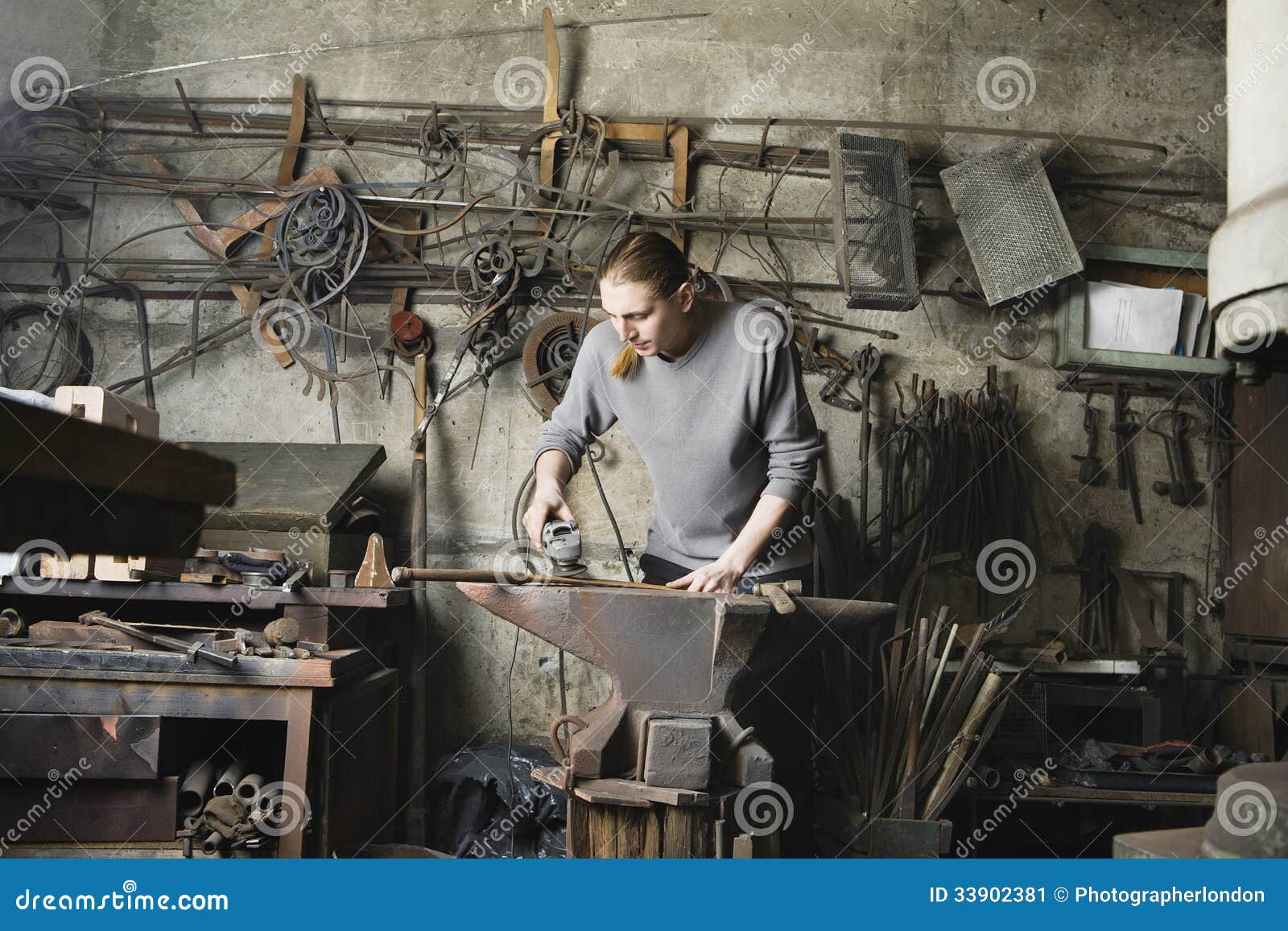 Blacksmith Working in Workshop Stock Image - Image of working, making ...