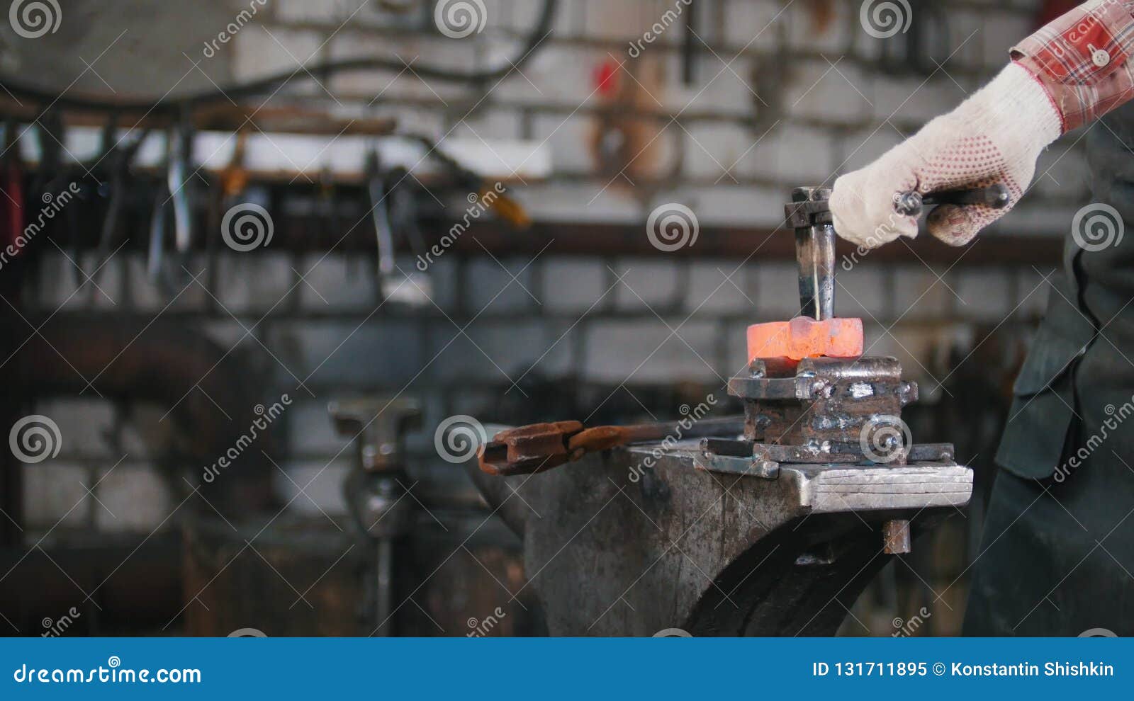 Blacksmith Workroom. Making a Detail Using a Hammer and a Chisel Stock ...