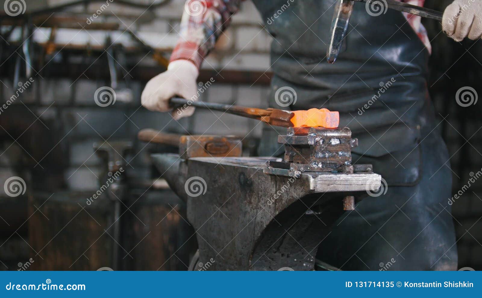 Blacksmith Workroom. Making a Detail Using a Hammer and a Chisel Stock ...