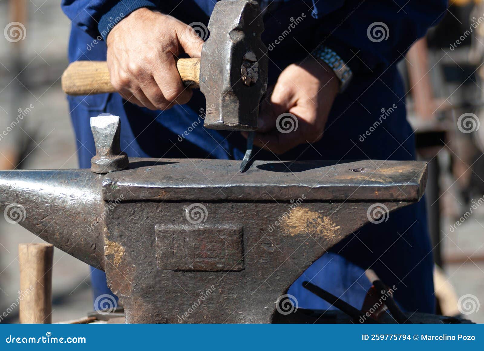 Blacksmith Hammering on a Metal Anvil Stock Photo - Image of hand, heat ...