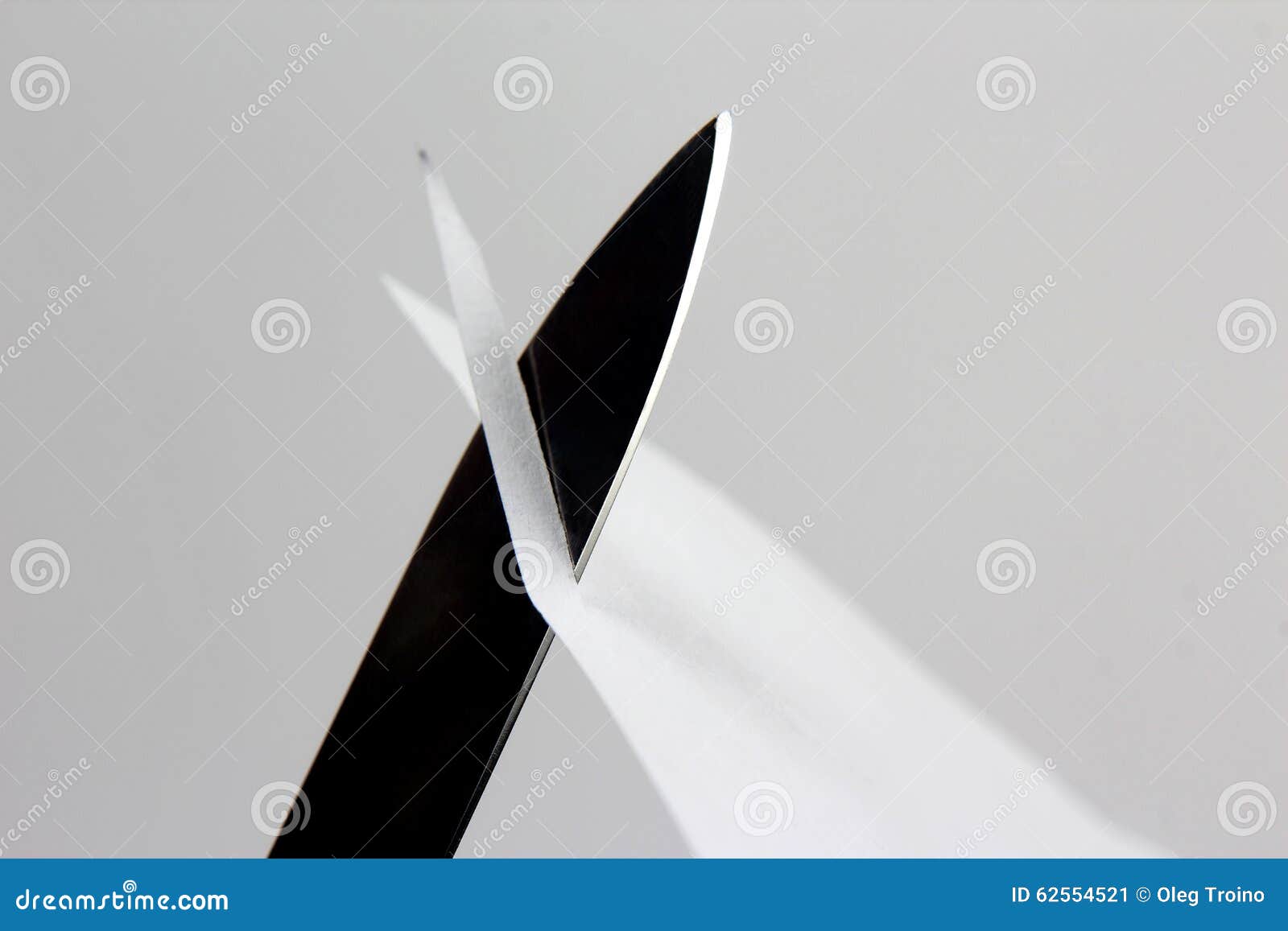Blade of a Sharp Knife Cut Across the White Paper Stock Image - Image ...