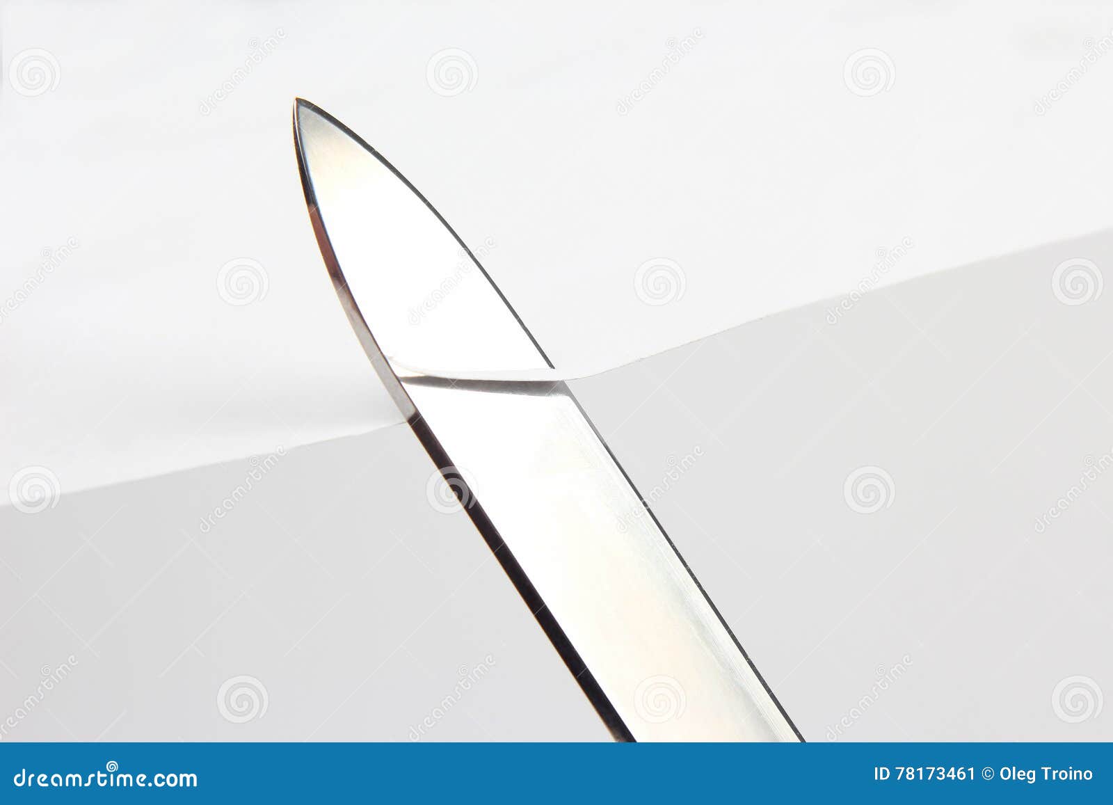 Blade of a Sharp Knife Cut Across the White Paper Stock Image - Image ...