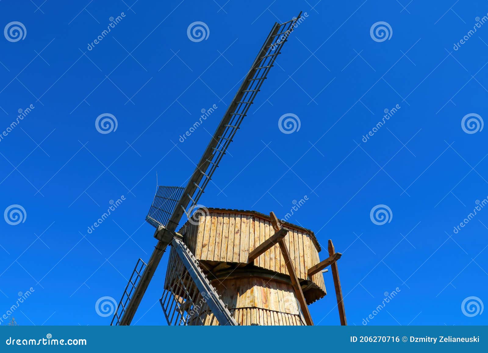 Blades of an Old Wooden Mill on a Background of Blue Sky Stock Photo ...