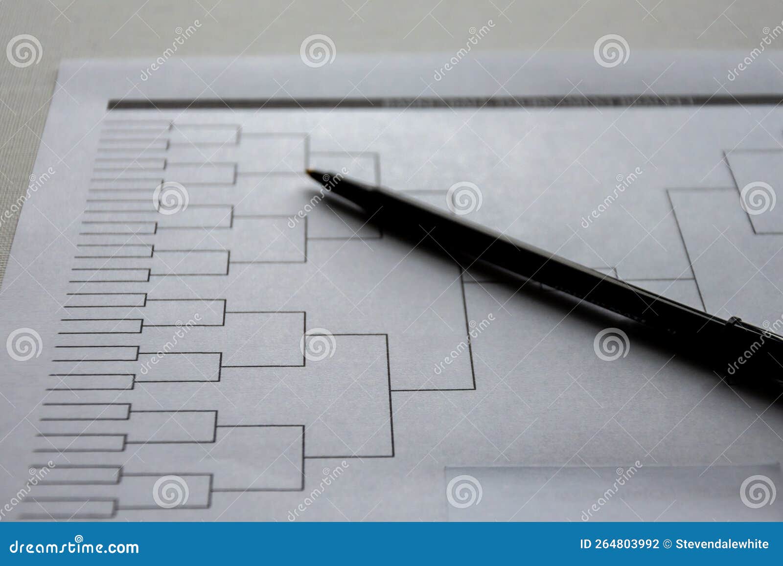 Blank Basketball Bracket Grid on White Paper with Pen Laying on Top ...