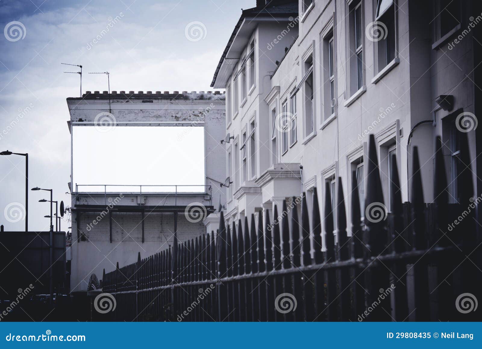 Billboard on Wall at End of Street Stock Image - Image of board ...
