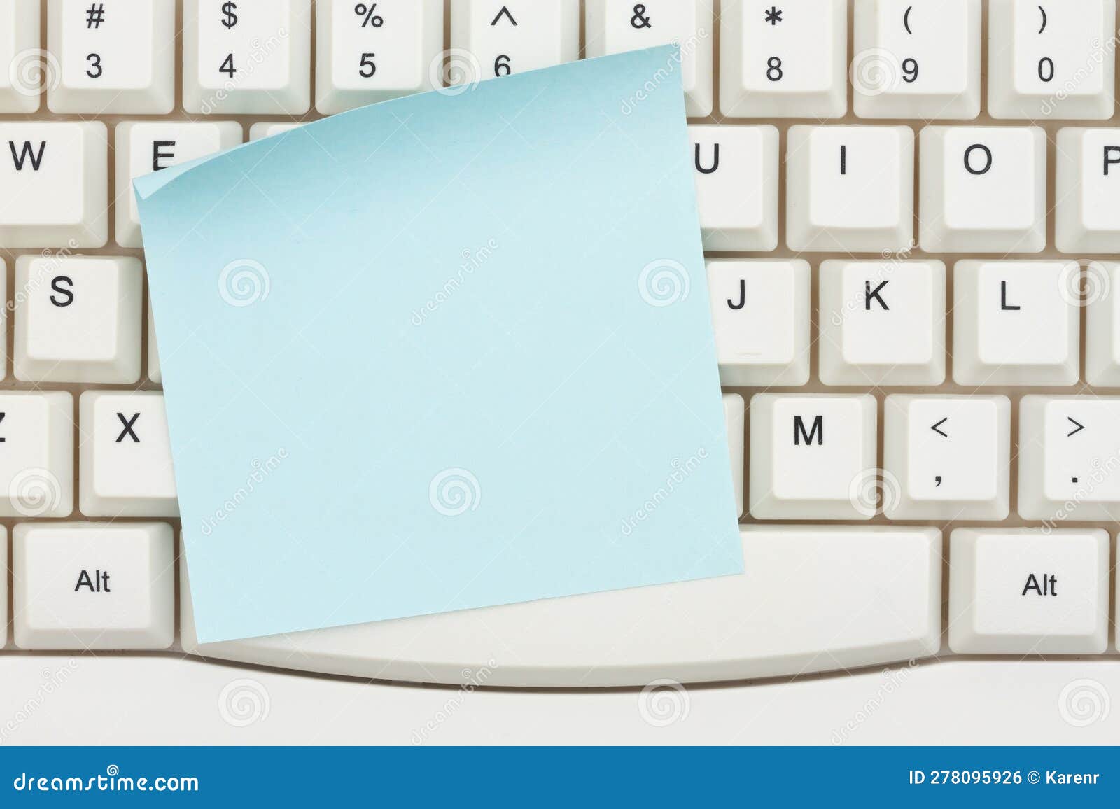 Blank Blue Sticky Note on a Gray Computer Keyboard Stock Photo - Image ...